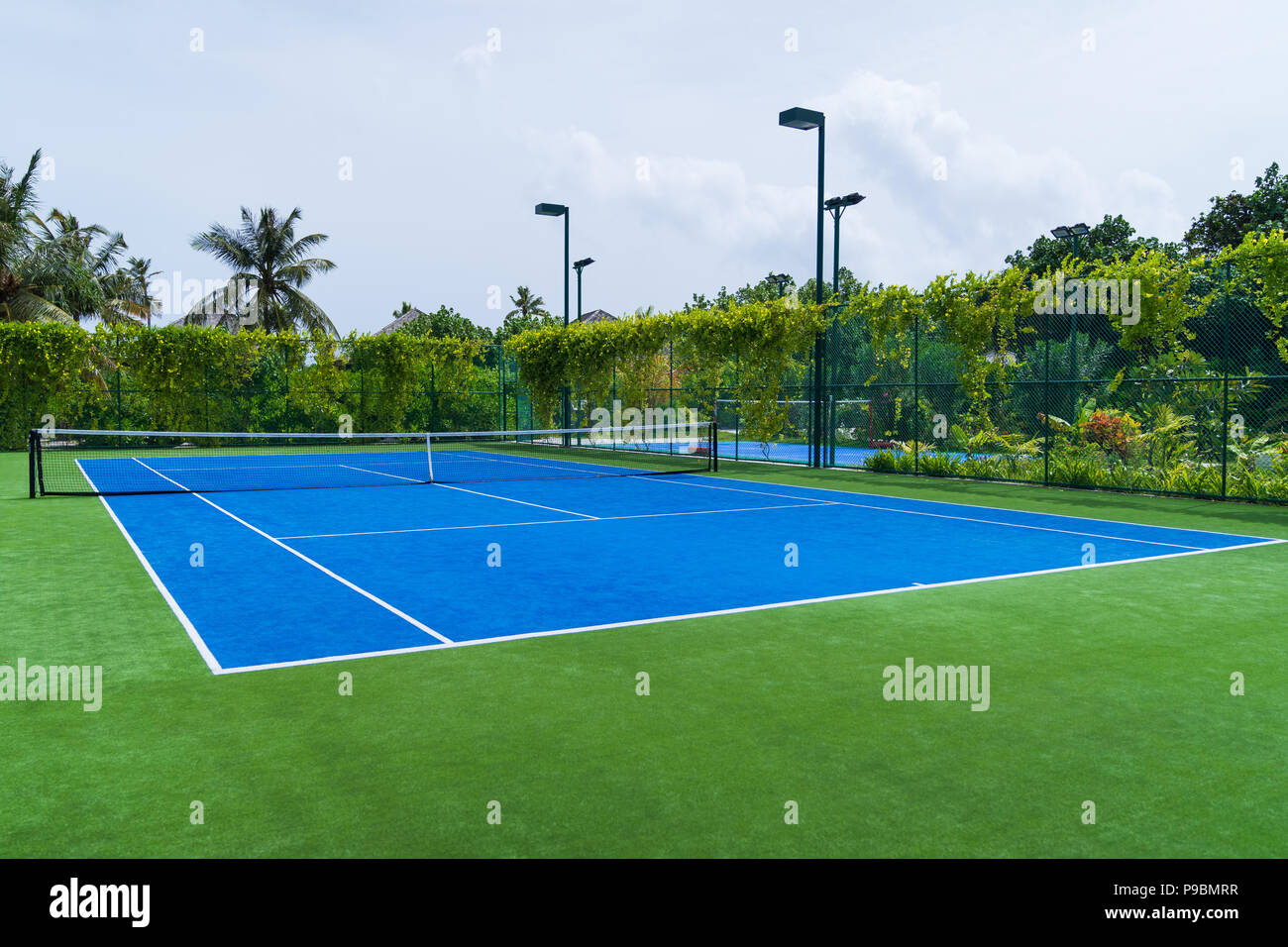New blue tennis field, sport concept background Stock Photo - Alamy