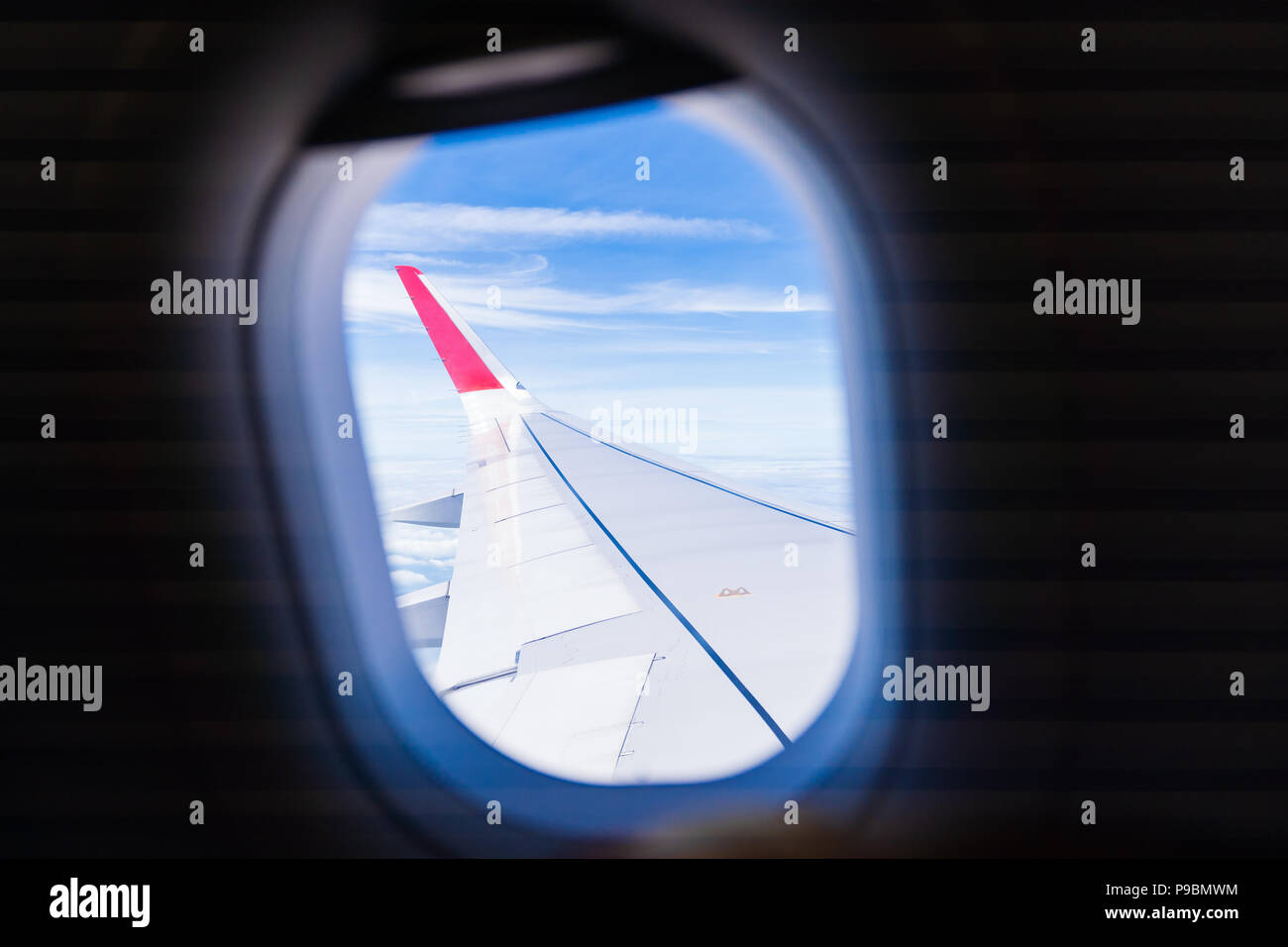 Beautiful blue sky view outside window airplane Stock Photo - Alamy