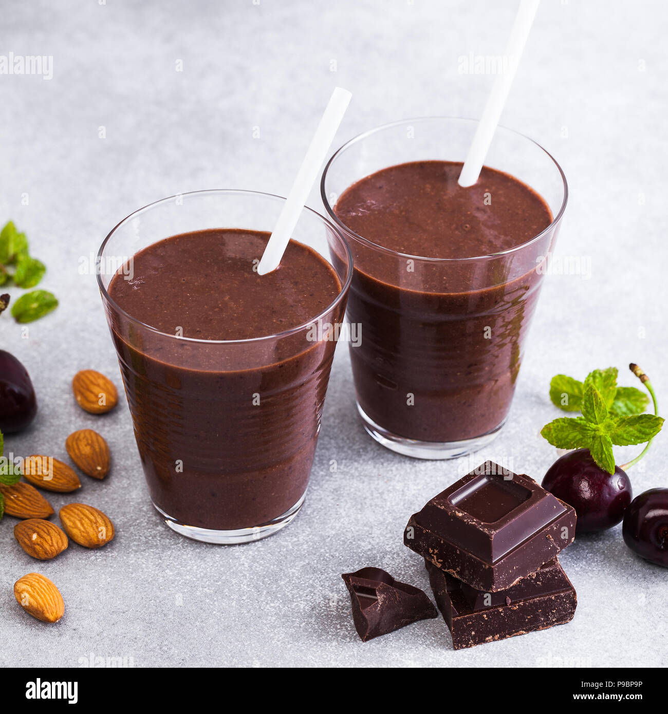 Black forest smoothies on the gray surface of the table. chocolate milk ...