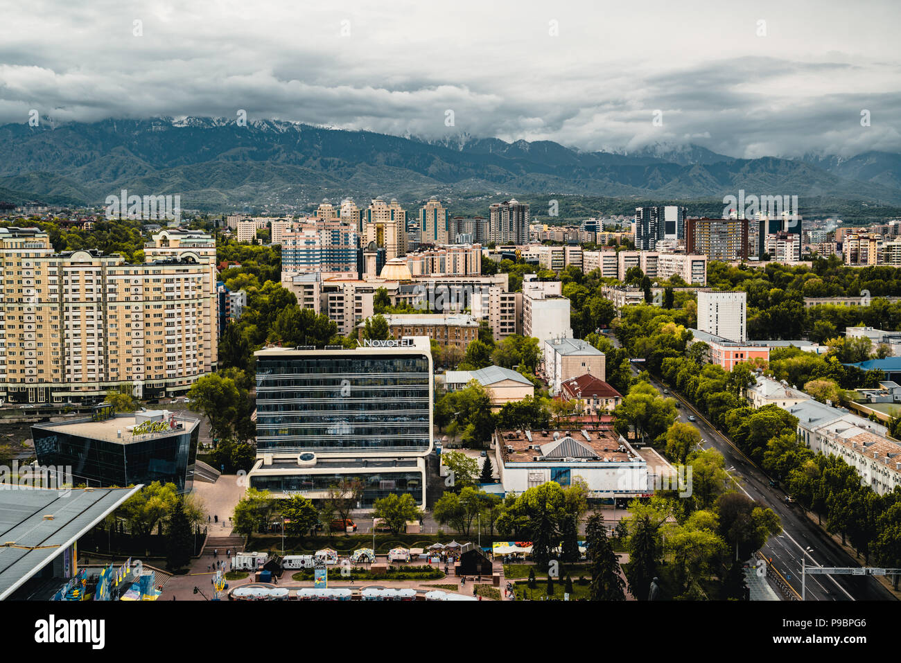 Almaty City landscape with snow-capped Tian Shan mountains in Almaty ...