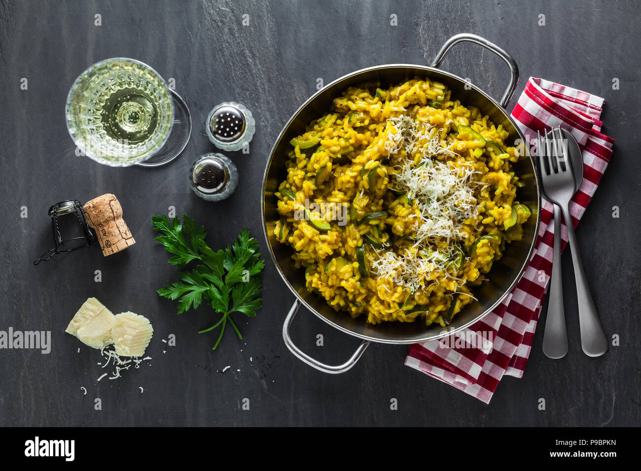 Italian dish yellow Risotto milanese with saffron, zucchini and ...