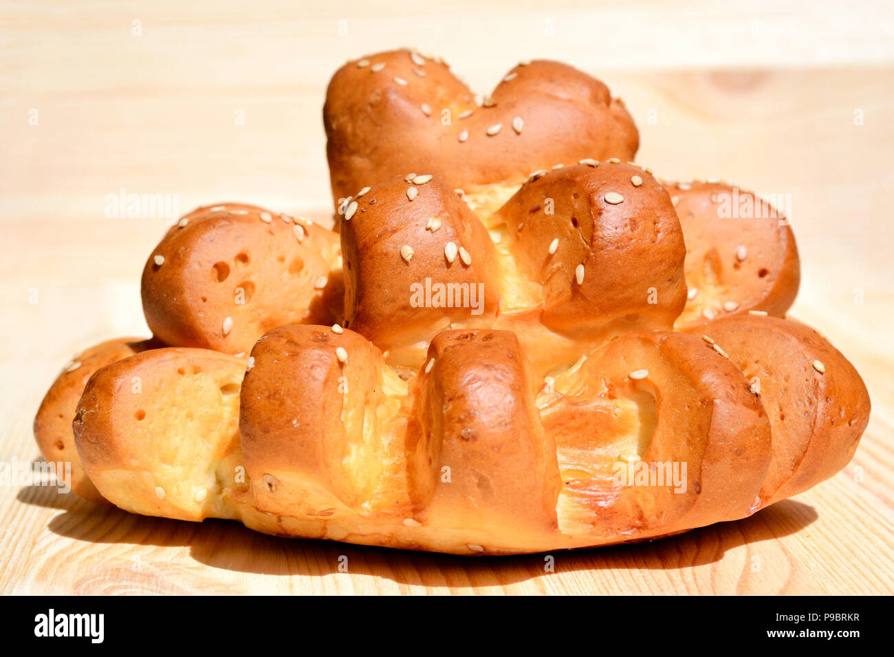Bun of hedgehog shape on a light background Stock Photo - Alamy