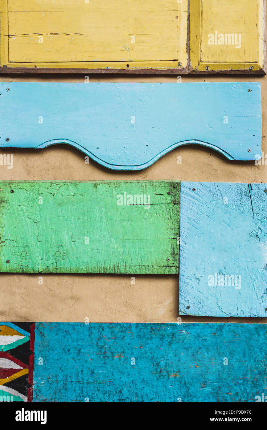 Wooden wall with different multicolor boards, empty place for text ...
