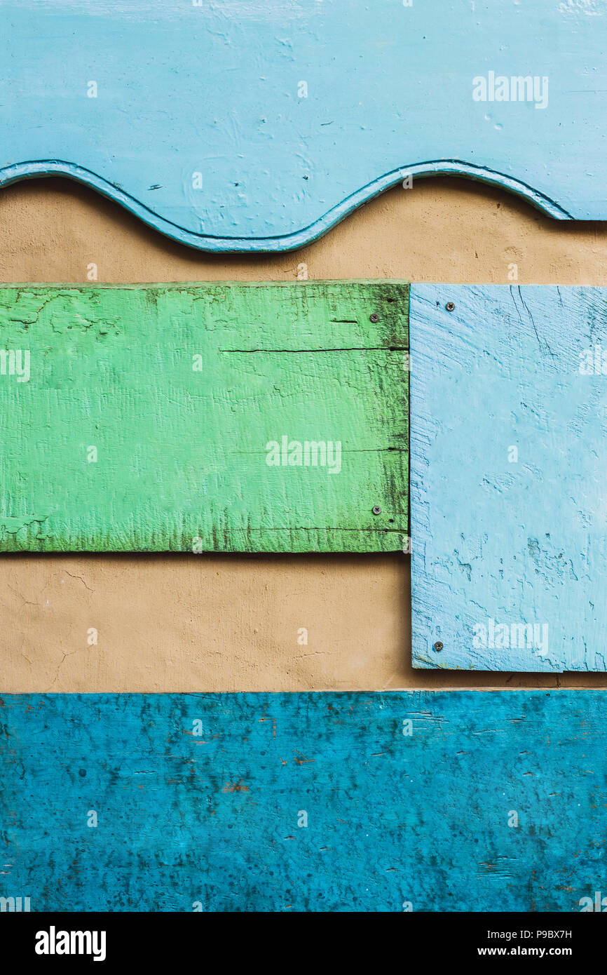 Wooden wall with different multicolor boards, empty place for text ...
