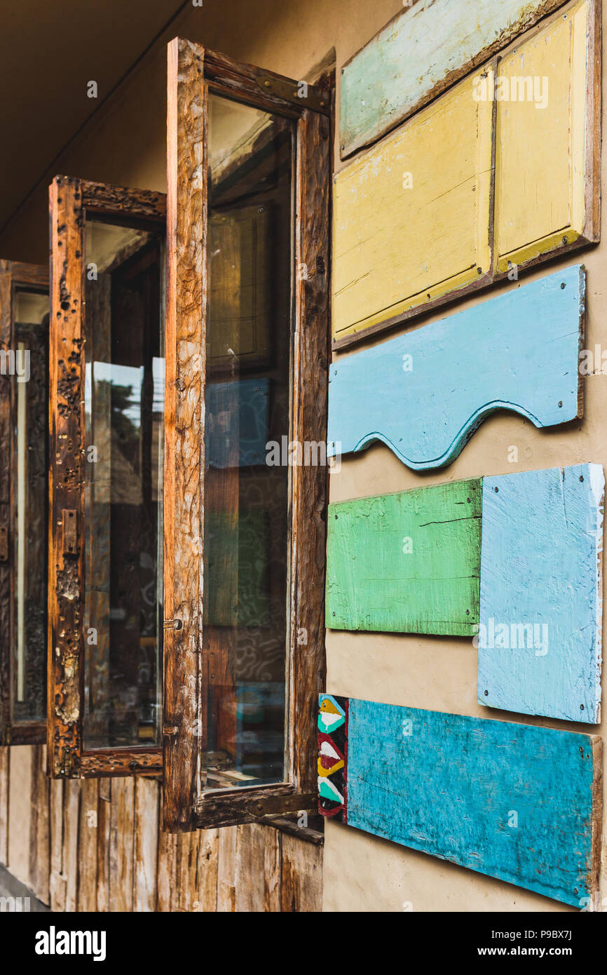 Wooden wall with different multicolor boards, empty place for text ...