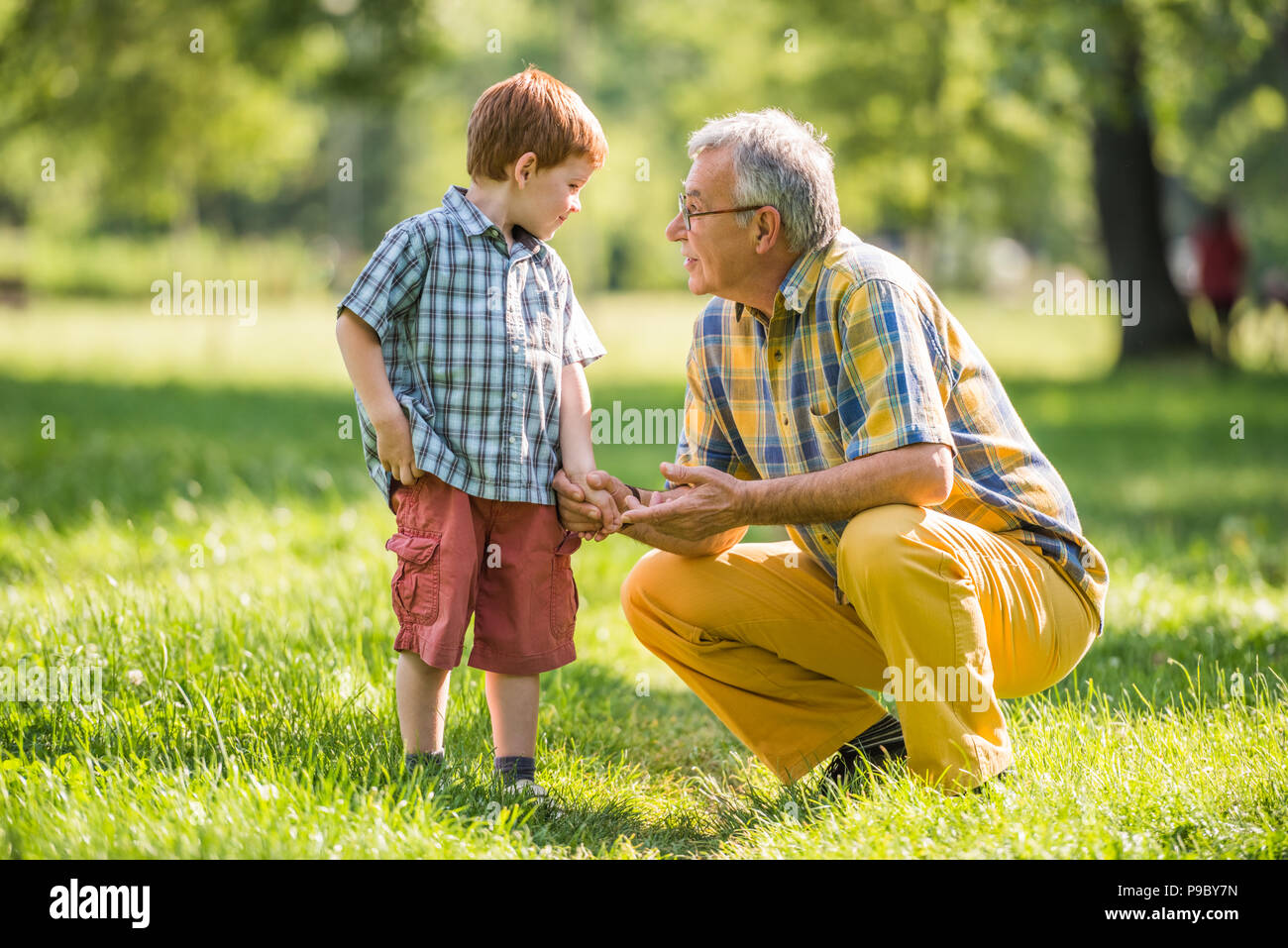 Grandfather boy talking hi-res stock photography and images - Alamy