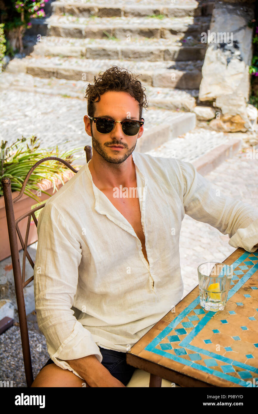 Man drinking water handsome hi-res stock photography and images - Alamy