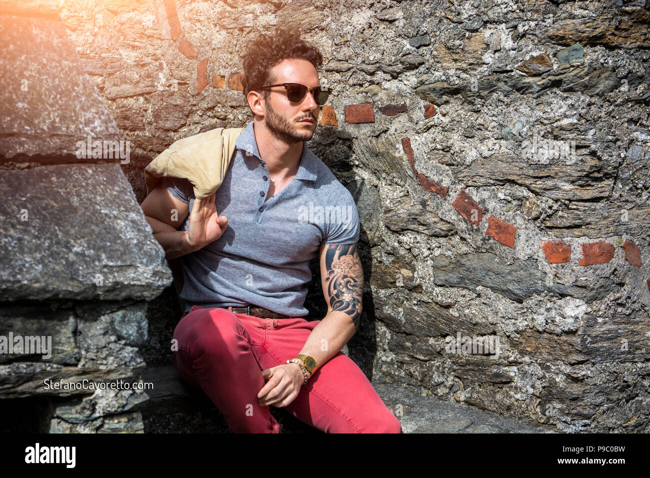 Attractive man outdoor in old European castle Stock Photo - Alamy