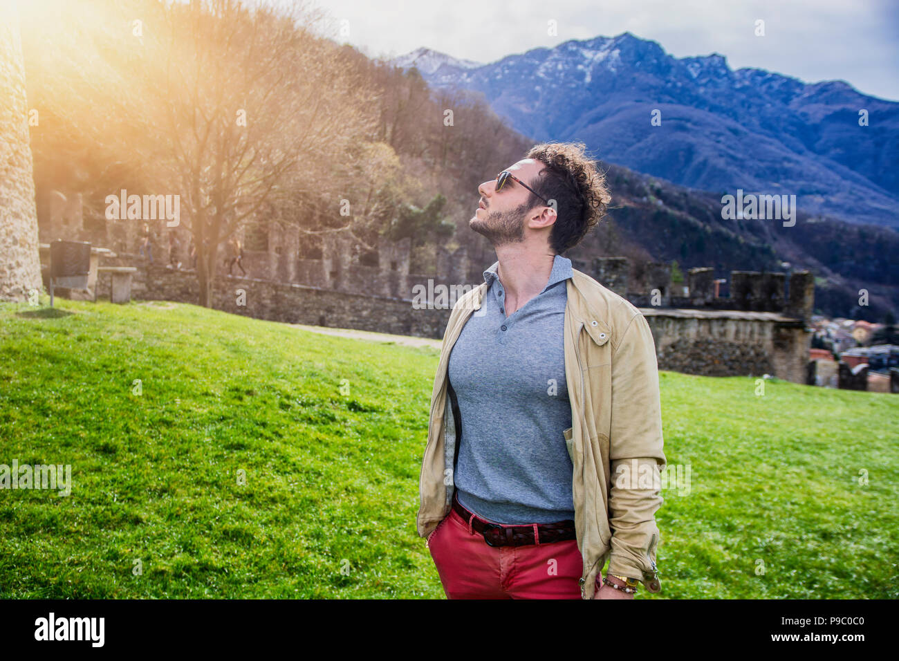 Attractive man outdoor in old European castle Stock Photo - Alamy