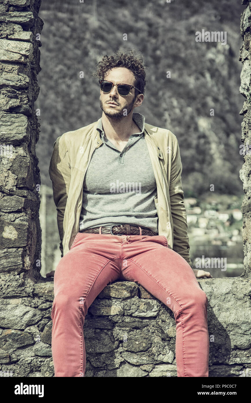 Attractive man outdoor in old European castle Stock Photo - Alamy