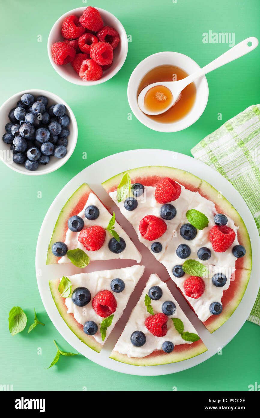 watermelon pizza slices with yogurt and berries, summer dessert Stock ...