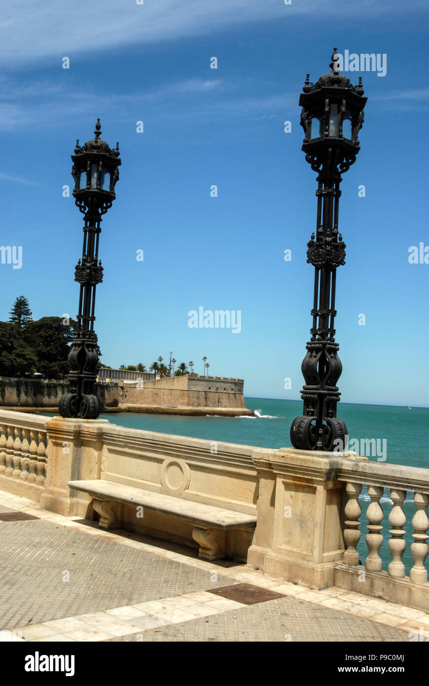 A pair of ornamental street lights along Alameda Apodaca in Cadiz ...