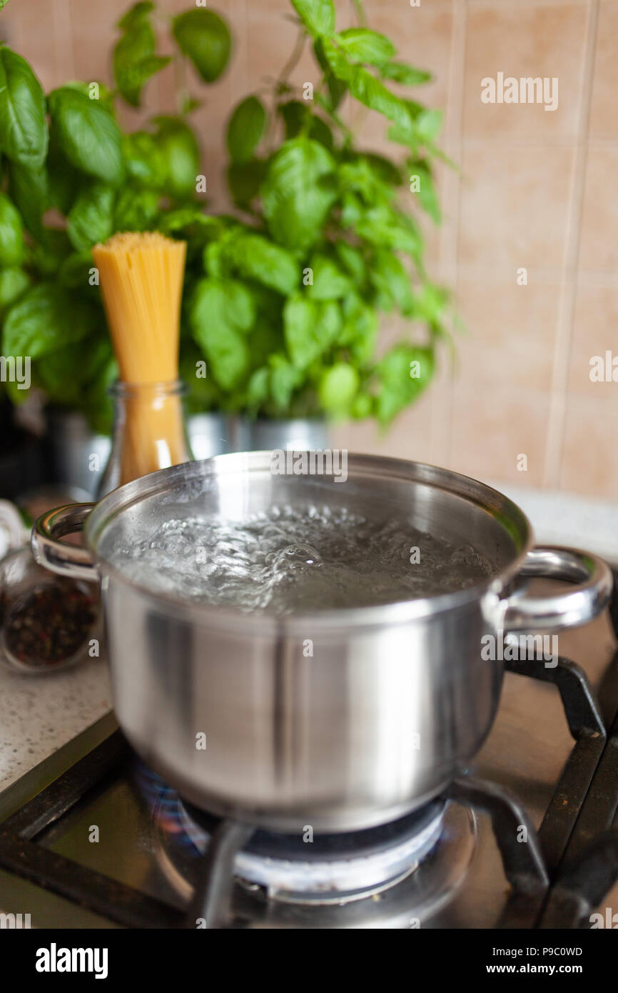 Cooking spaghetti in a pot Stock Photo - Alamy
