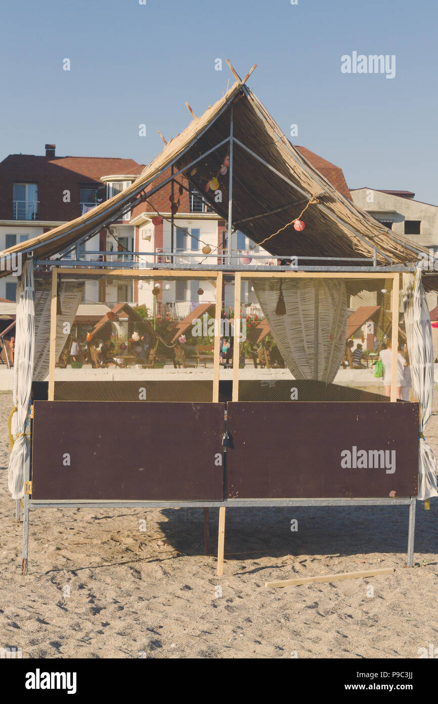 Wooden beach house decorated with sea shells on the beach Stock Photo ...