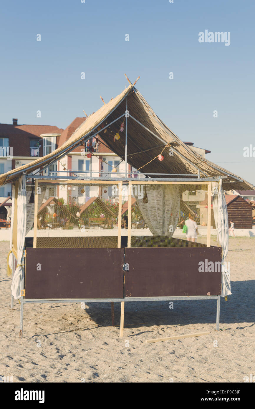 Wooden beach house decorated with sea shells on the beach Stock Photo ...