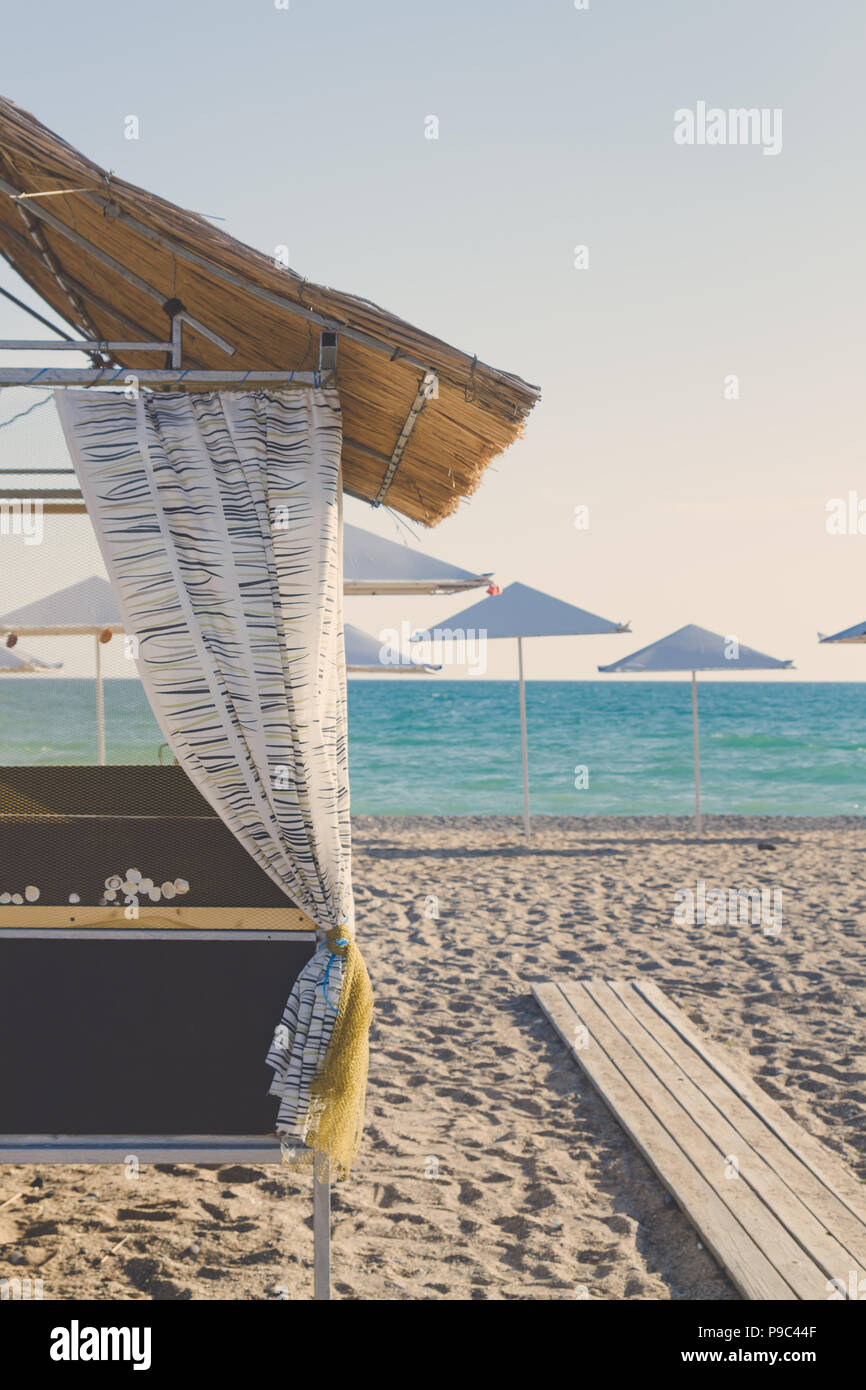 Wooden beach house decorated with sea shells on the beach Stock Photo ...