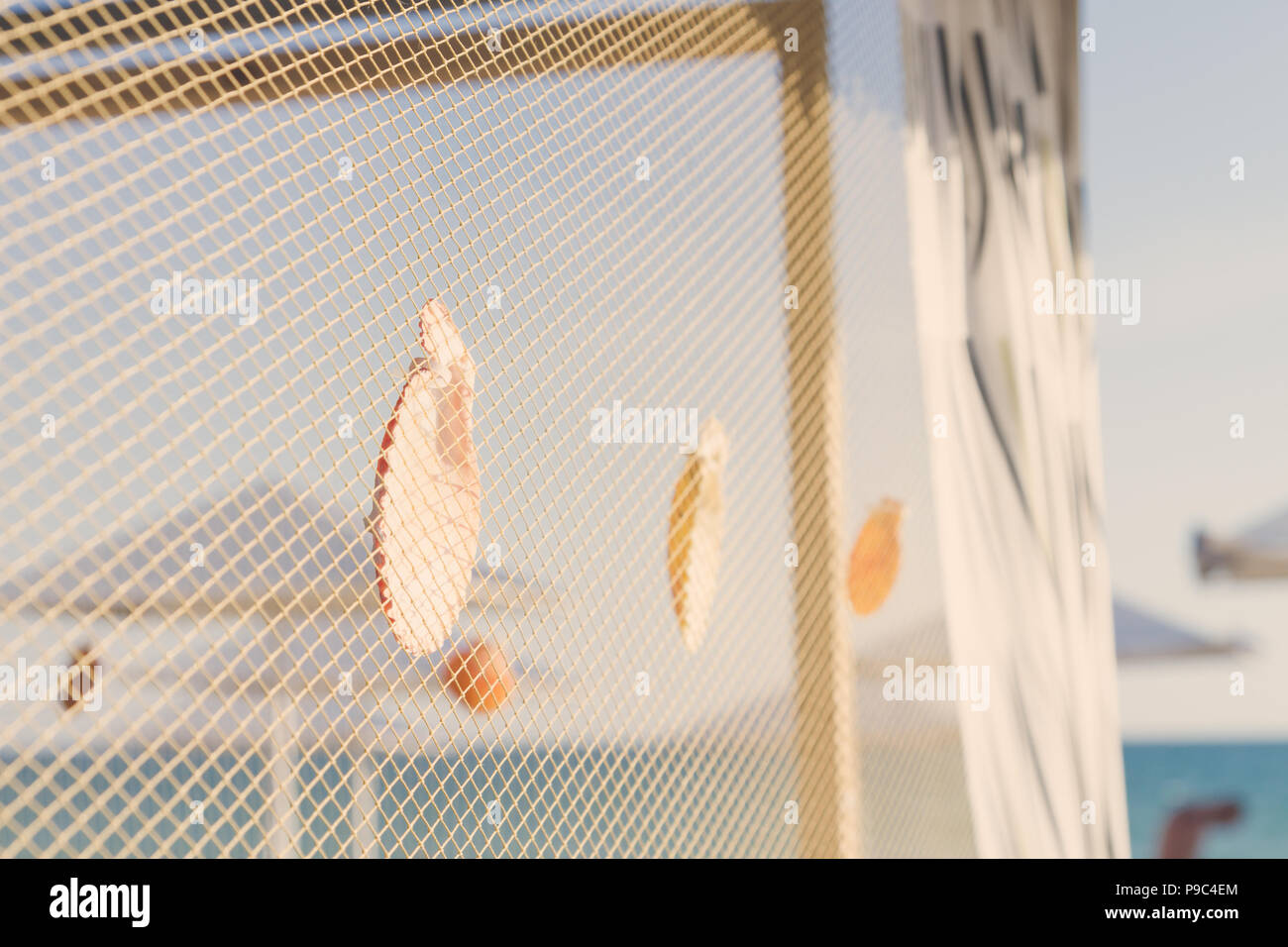 Wooden beach house decorated with sea shells on the beach Stock Photo ...
