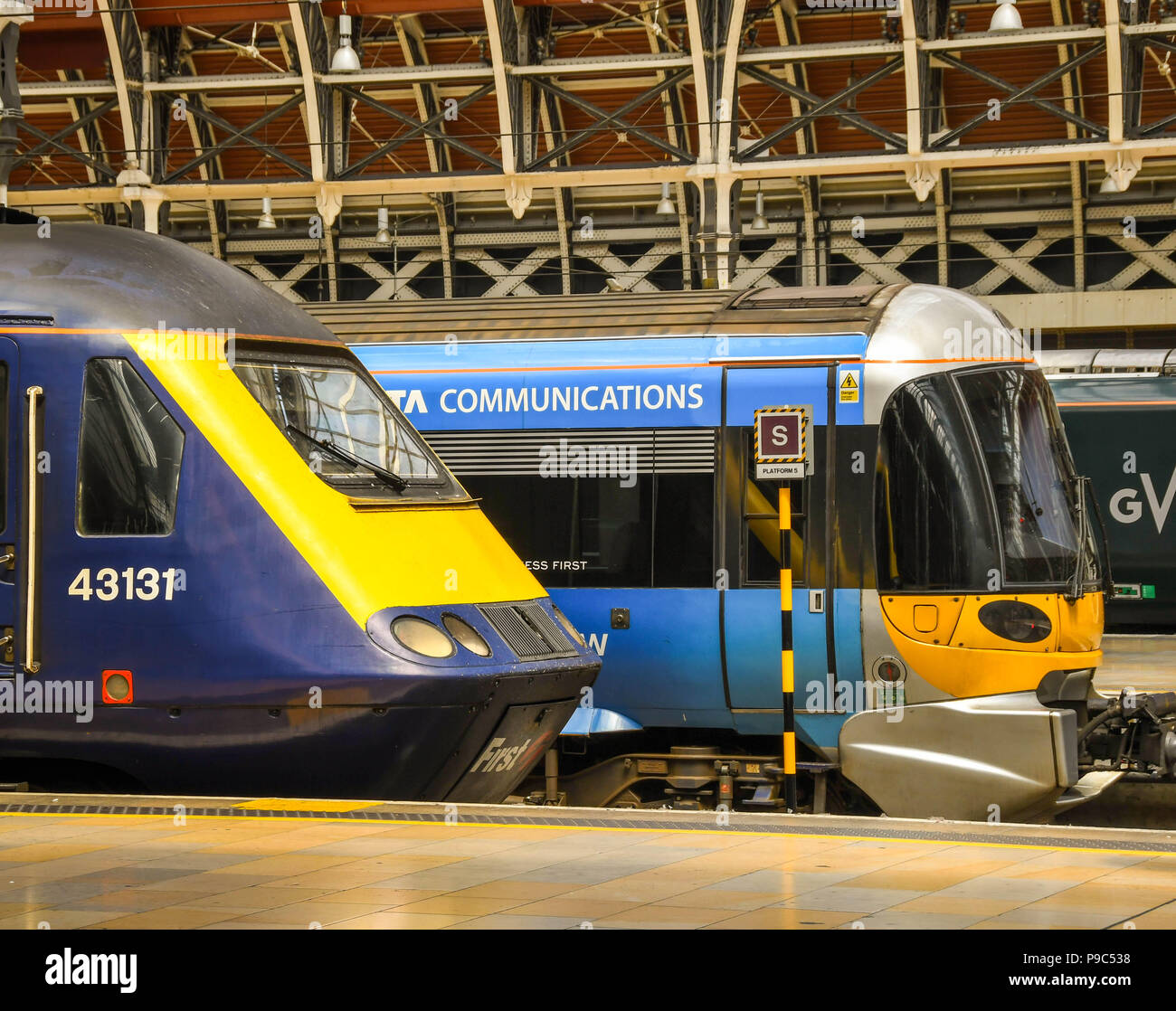 Old HS125 inter city diesel train alongside a modern Heathrow Express ...