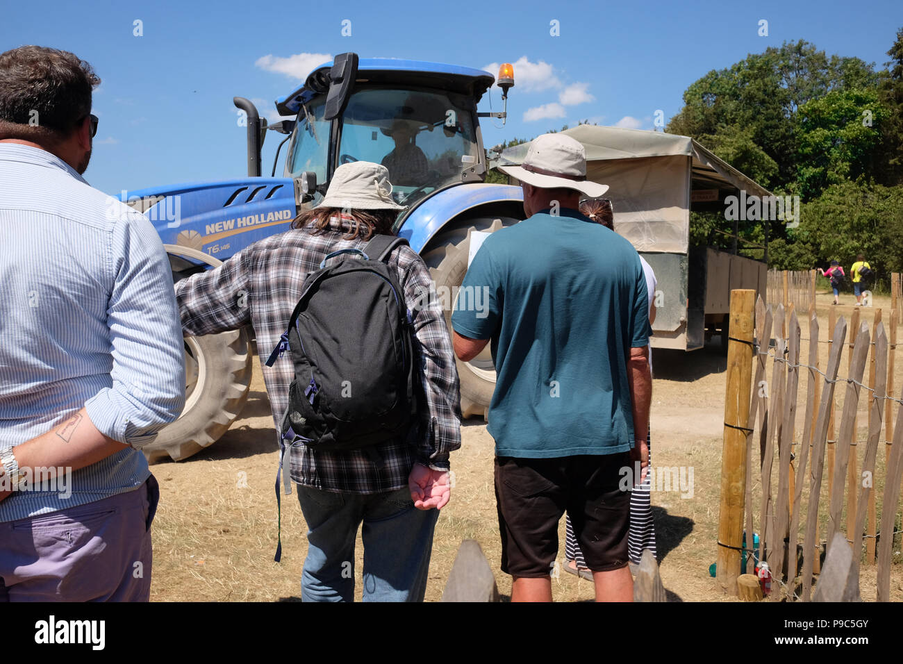 July 2018 - Queues of folk waiting for the tractor ride to the top of ...