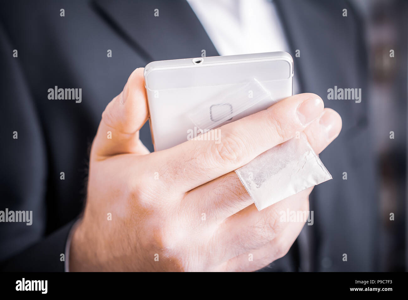 Businessman In Suit Hiding A Little Bag Of Drugs With White Powder ...