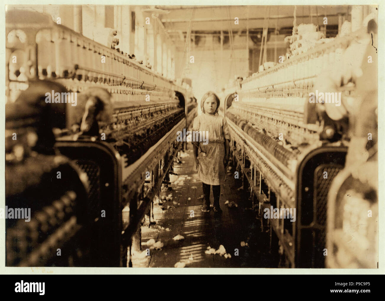 A little spinner in the Mollahan Mills, Newberry, S.C. She was tending ...