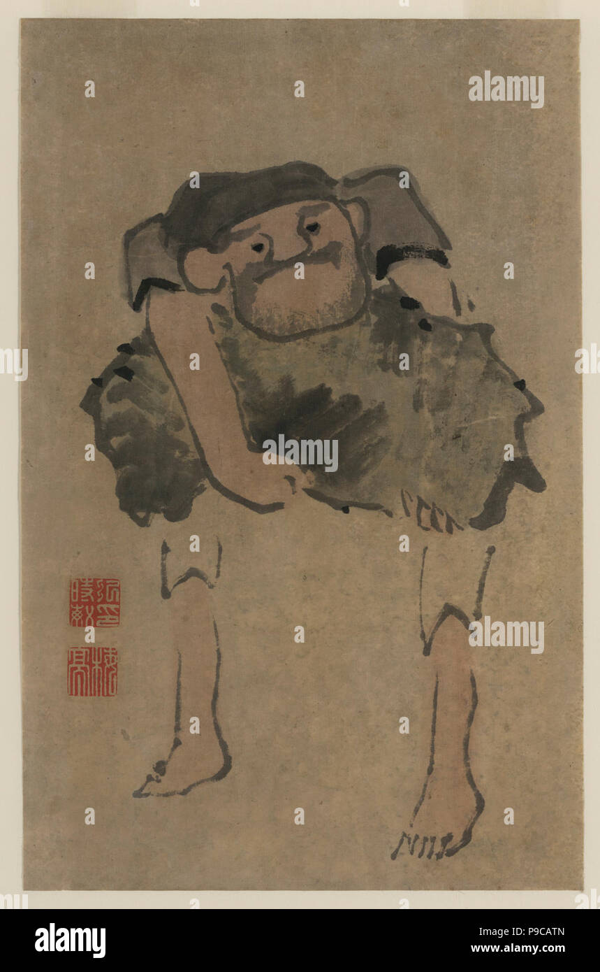 A man carrying a large object Stock Photo - Alamy