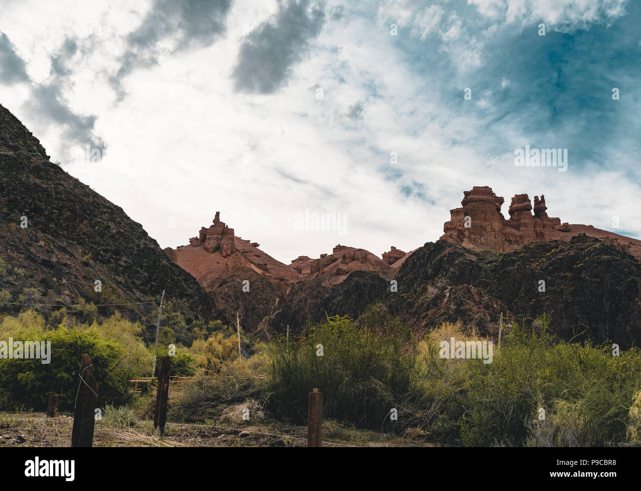 Charyn Grand Canyon with clouds and sun red orange stone Martian ...