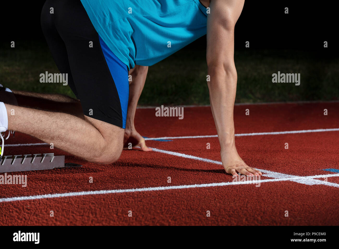 Male Sprinter In Blocks High Resolution Stock Photography and Images ...