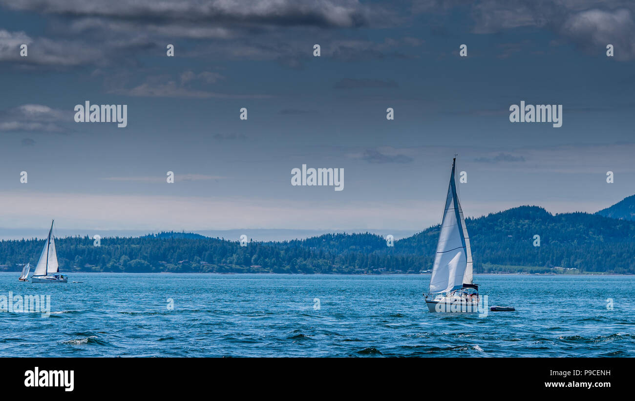 Boats sailing away Stock Photo - Alamy