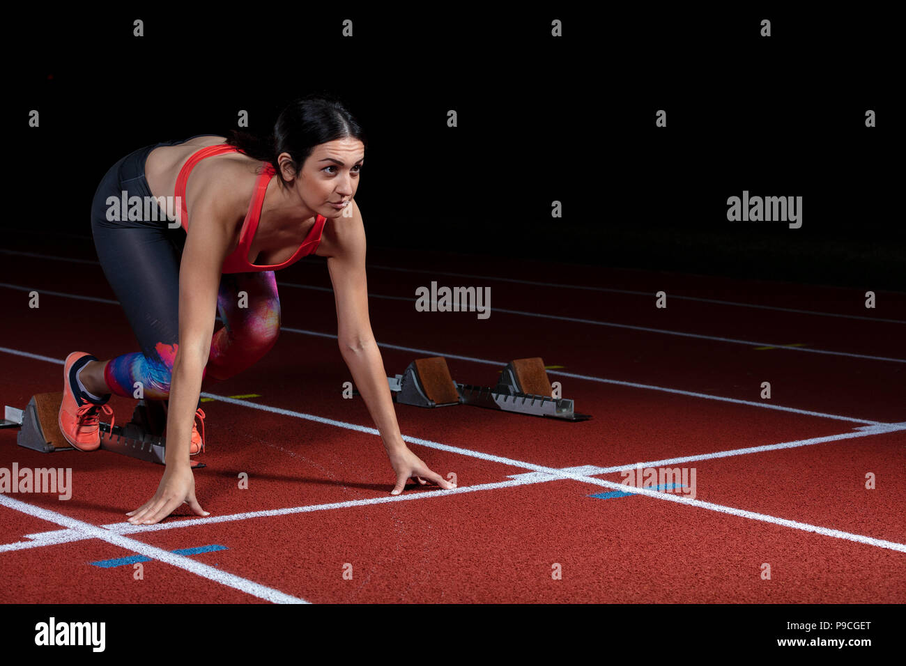 Female Sprinter Starting Stock Photos & Female Sprinter Starting Stock ...