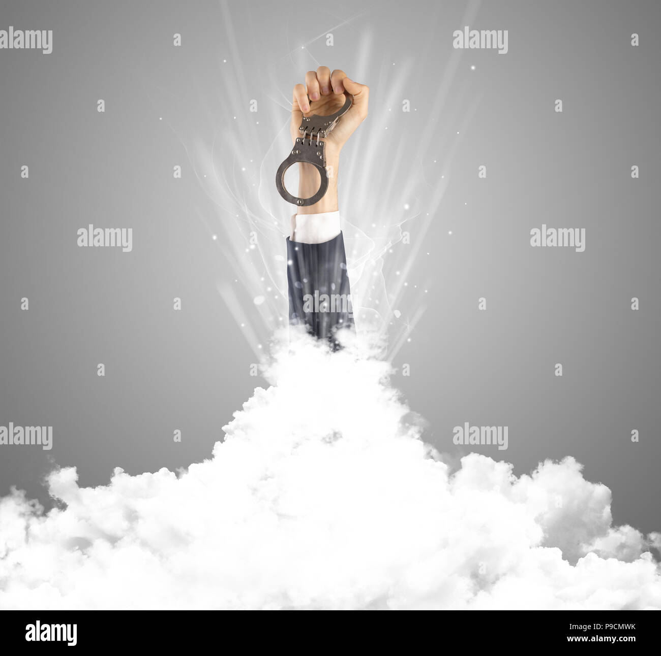 Hand breaking out from cloud Stock Photo - Alamy