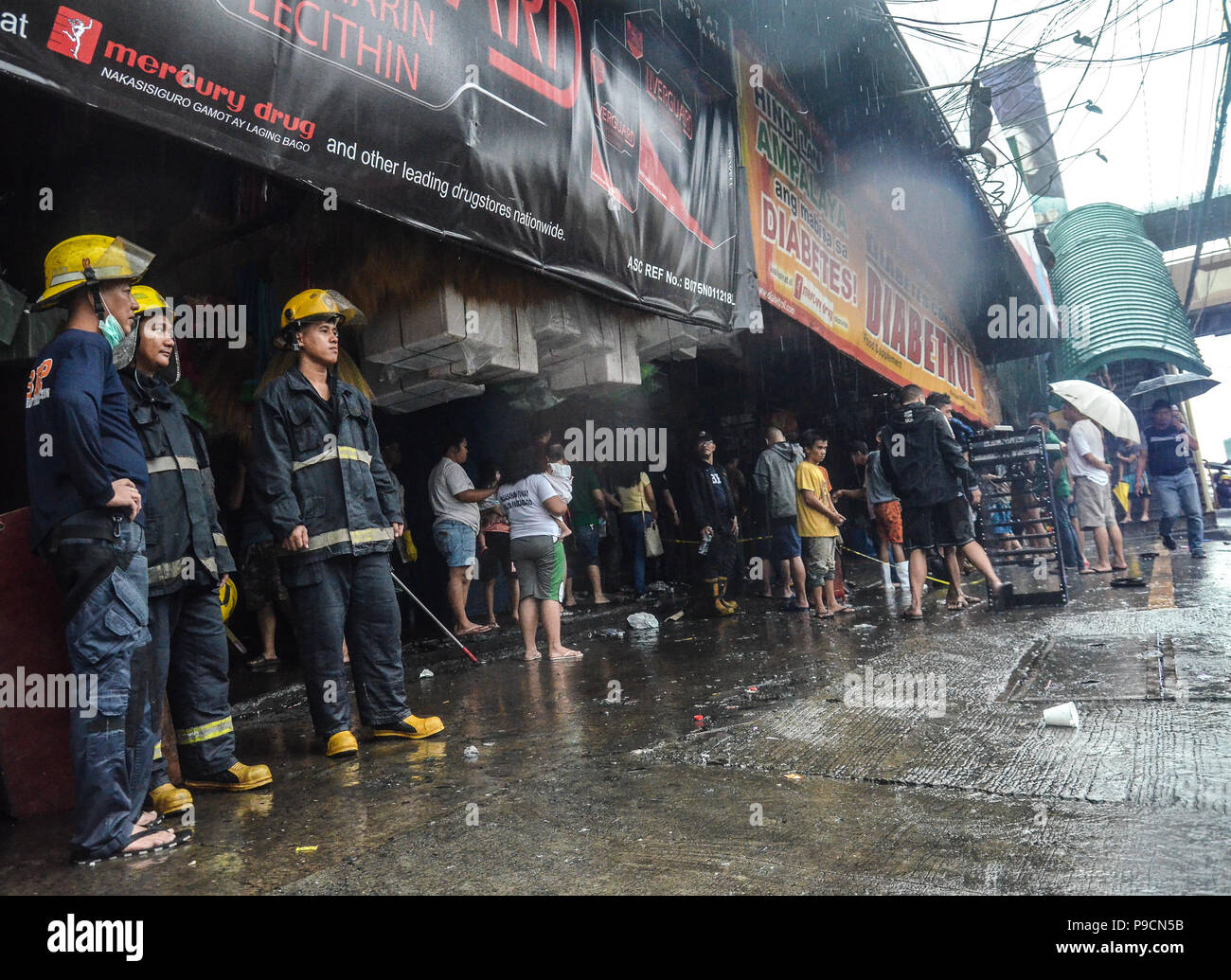 Cleaning up after a fire hi-res stock photography and images - Alamy