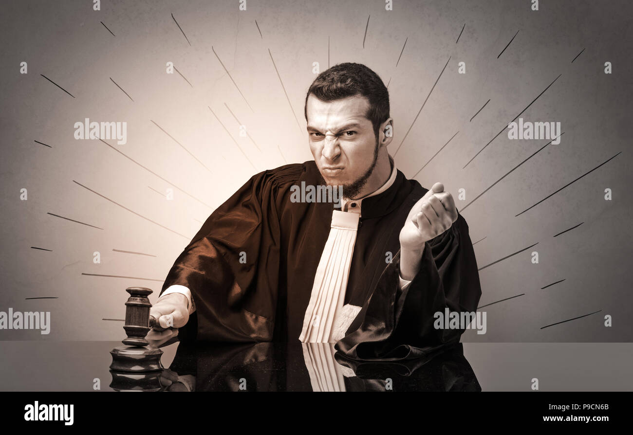 Young dashing judge in black gown making decision Stock Photo - Alamy