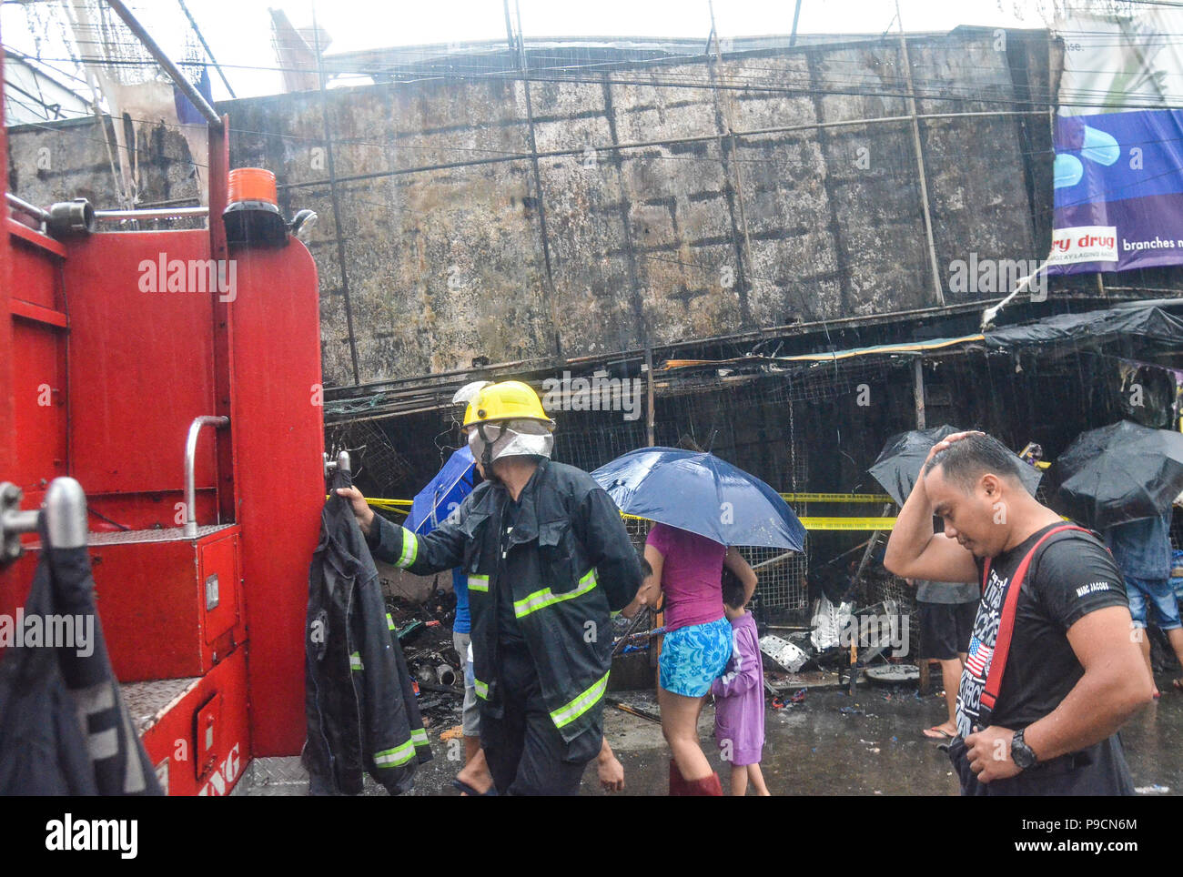 Quezon City, Philippines. 16th July, 2018. VICTORY. Firefighters after ...