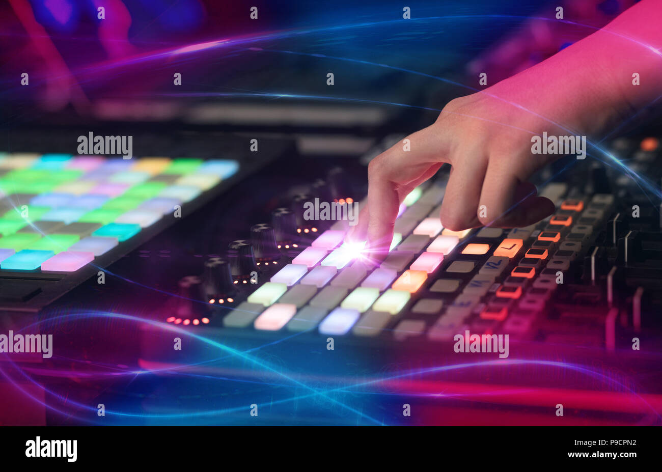 Hand mixing music on midi controller with wave vibe concept Stock Photo ...