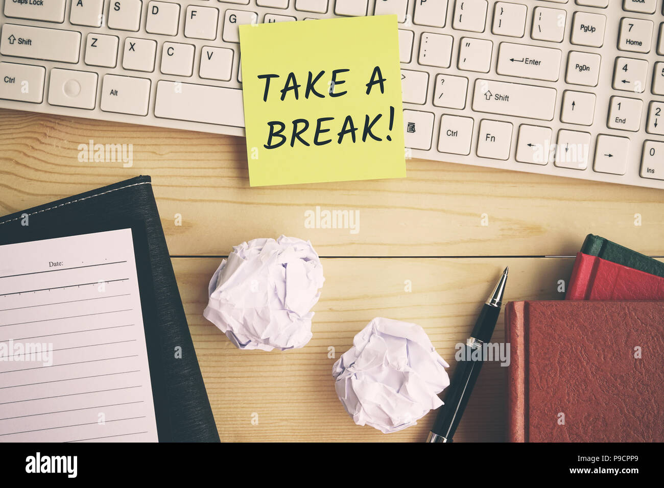 Take a break text on yellow paper on top of computer keyboard Stock ...