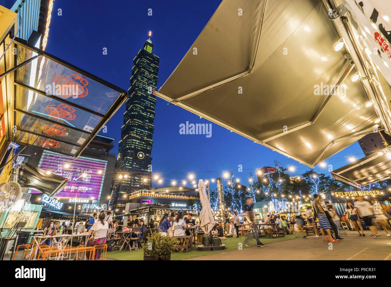 101 building with night market In Low Angle Shot Stock Photo - Alamy
