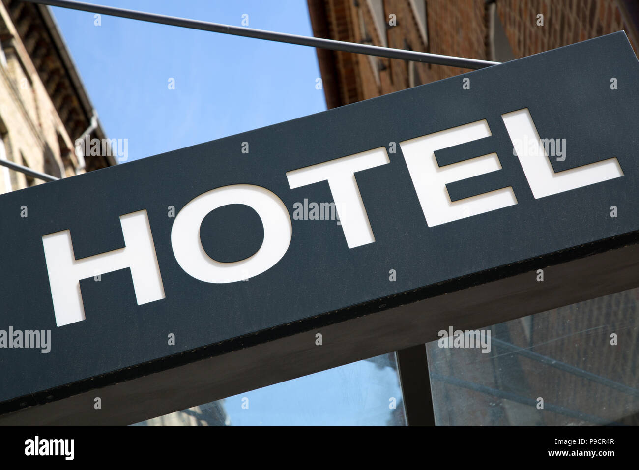 Hotel Sign on Building Facade Stock Photo - Alamy