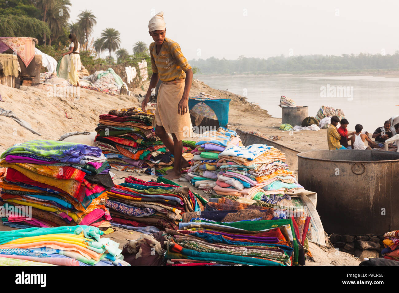 Man doing laundry by the river in Agra, India Stock Photo - Alamy