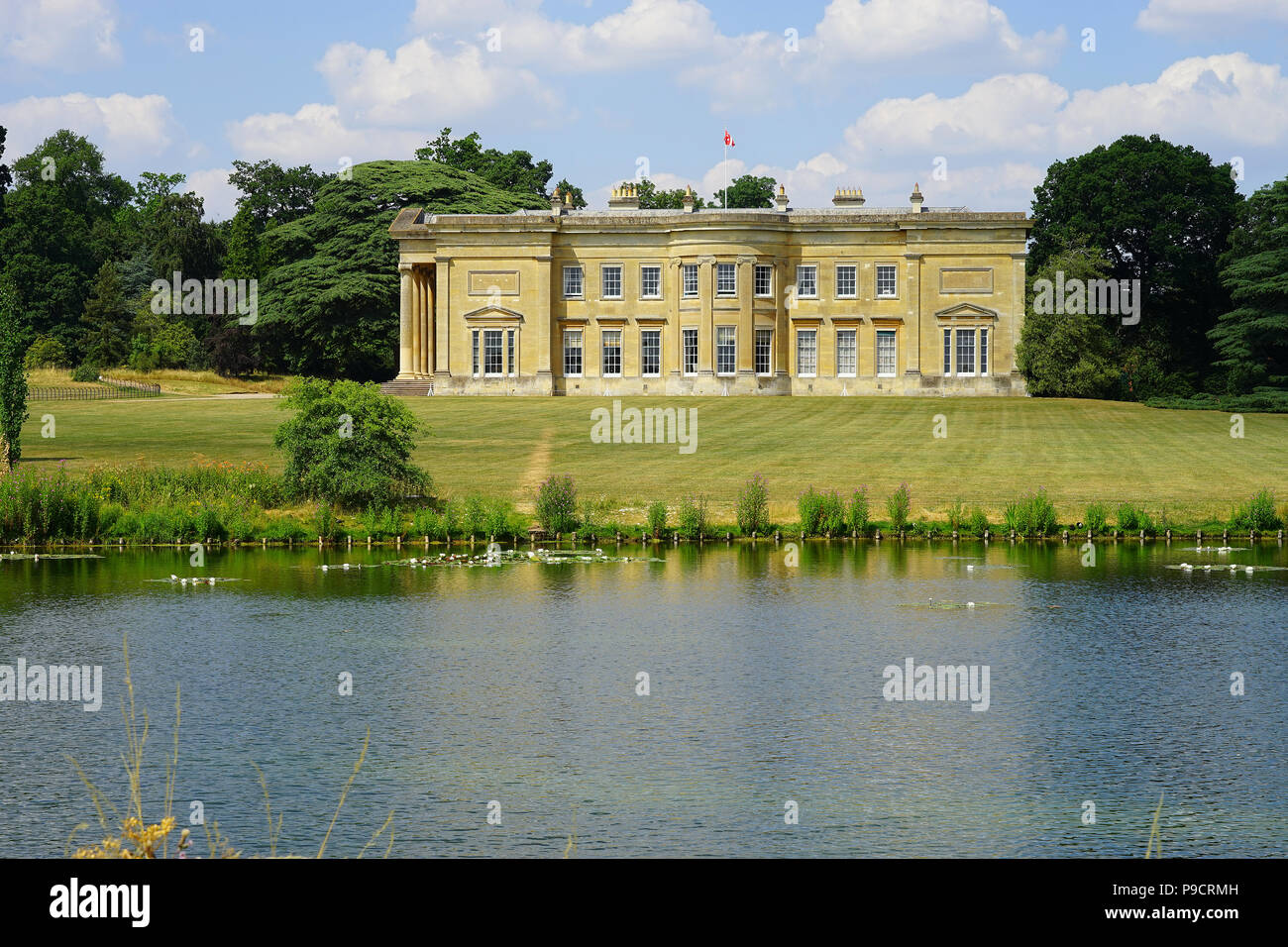 Spetchley Park from across the lake Stock Photo - Alamy