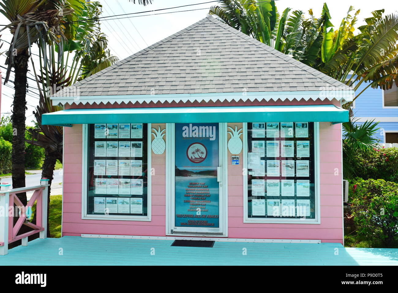 Pink and turquoise blue painted buildings in downtown Marsh Harbour ...