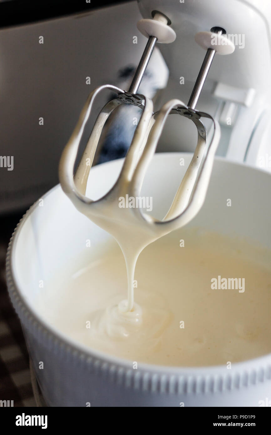 Making of a cream for home-made cakes on a mixer Stock Photo - Alamy