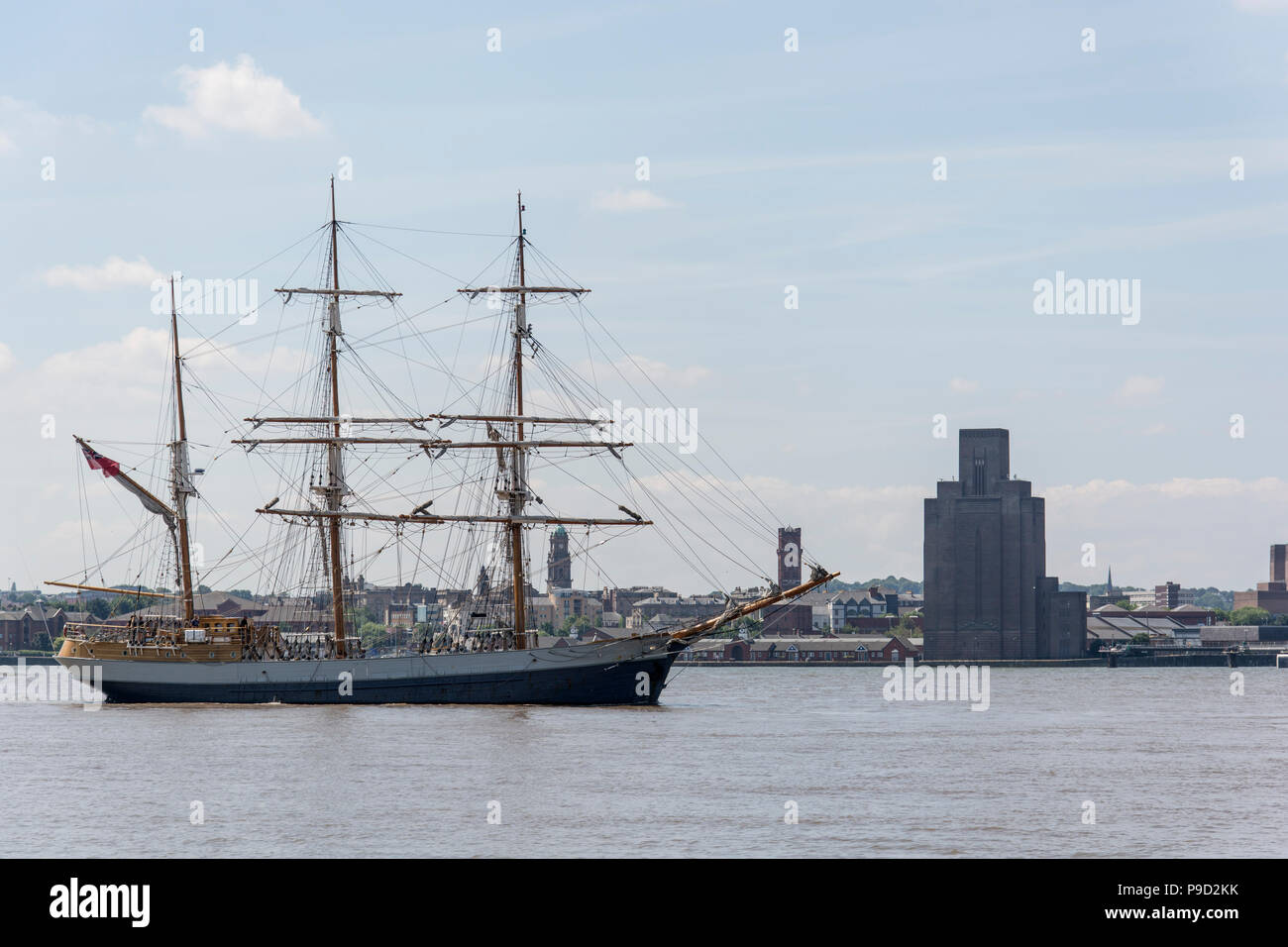 Tall Ship leaving Liverpool on the River Mersey high tide Stock Photo ...