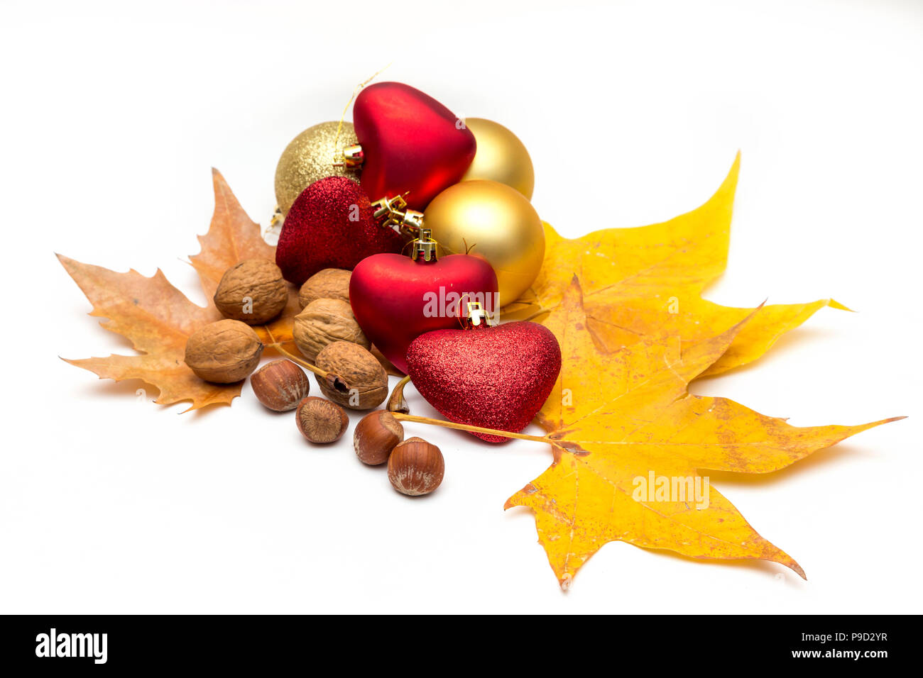 autumn fruits and yellow leaves, with various Christmas decorations on ...