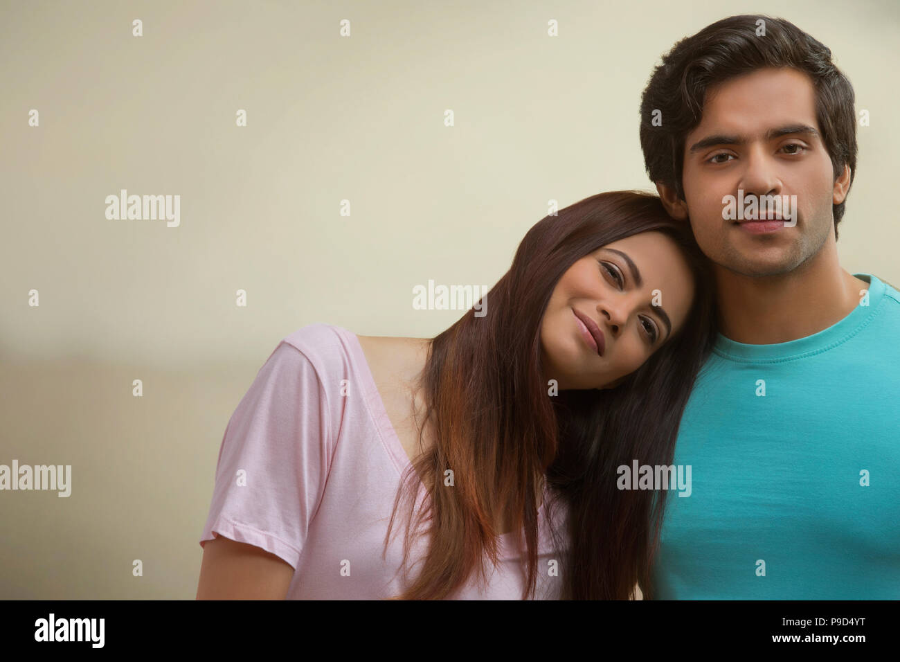 Woman leaning on mans shoulder hi-res stock photography and images - Alamy