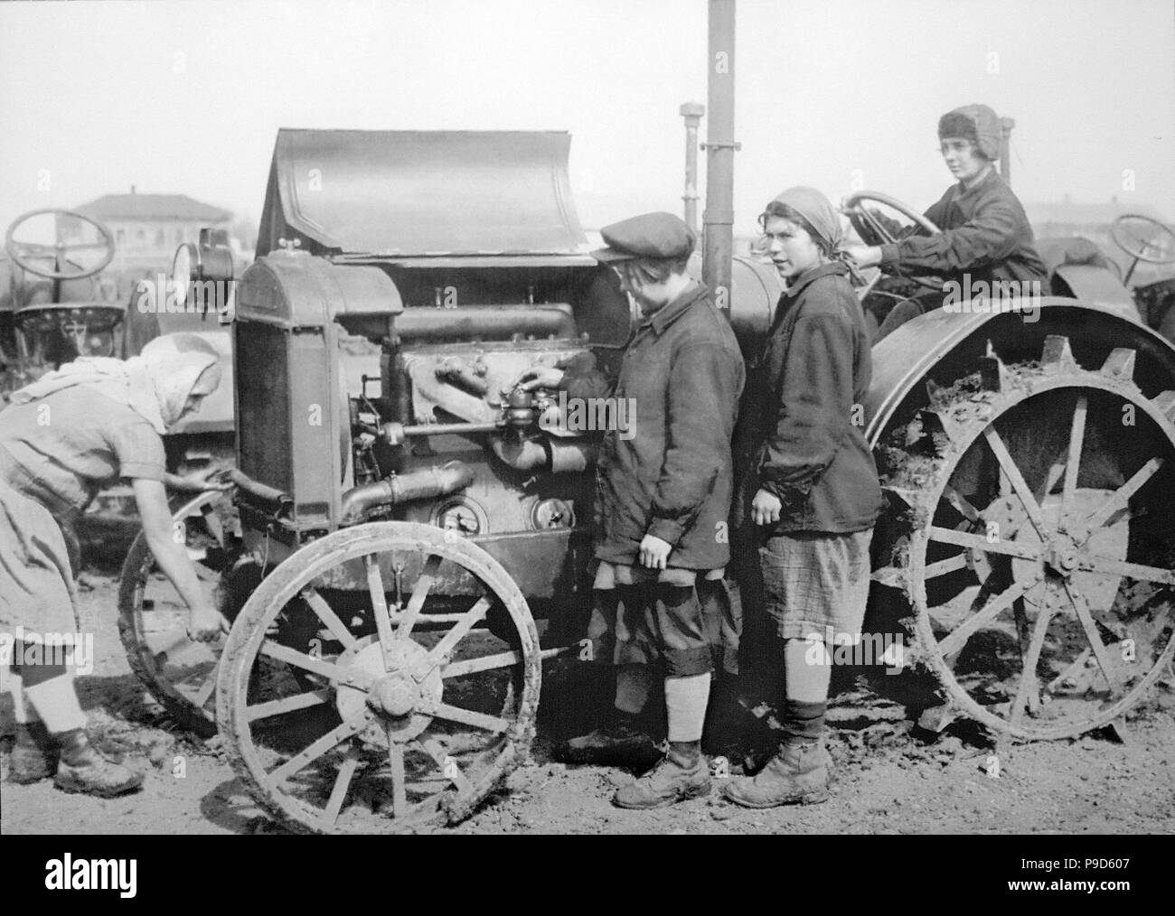Tractor drivers at the tractor "International". Museum: State Museum of ...