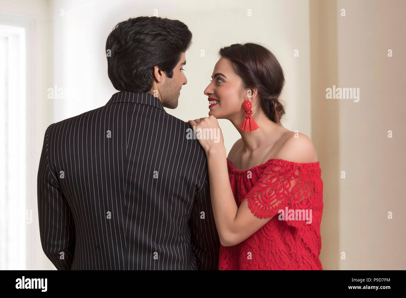 Romantic couple standing together Stock Photo - Alamy