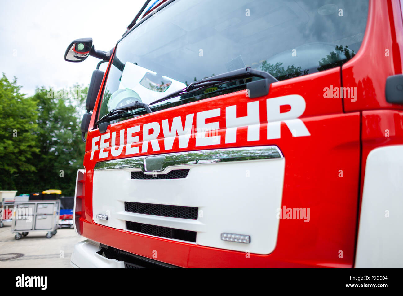 German fire engine stands on a deployment site. The german word ...