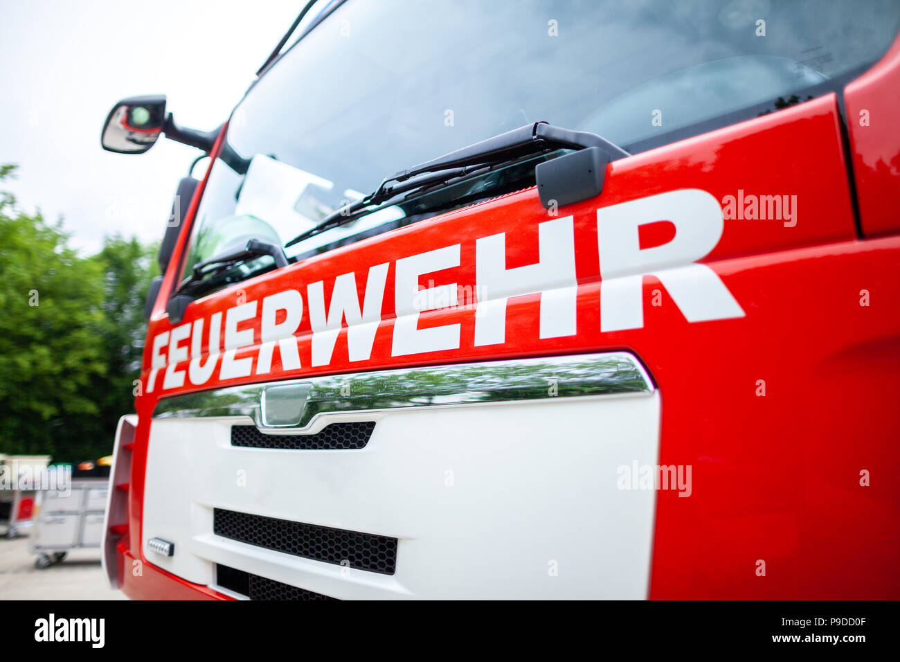 German fire engine stands on a deployment site. The german word ...