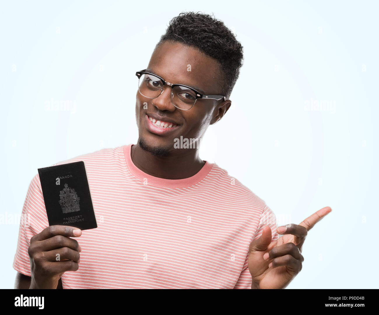 Canadian passport hand hi-res stock photography and images - Alamy